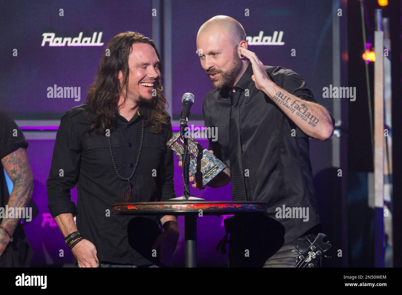 Kin Etik and Steve "Stevic" Mackay of Twelve Foot Ninja accept the ...