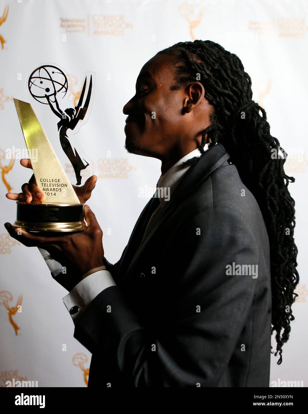 Khadif Sanders poses with his award at the 35th College Television ...