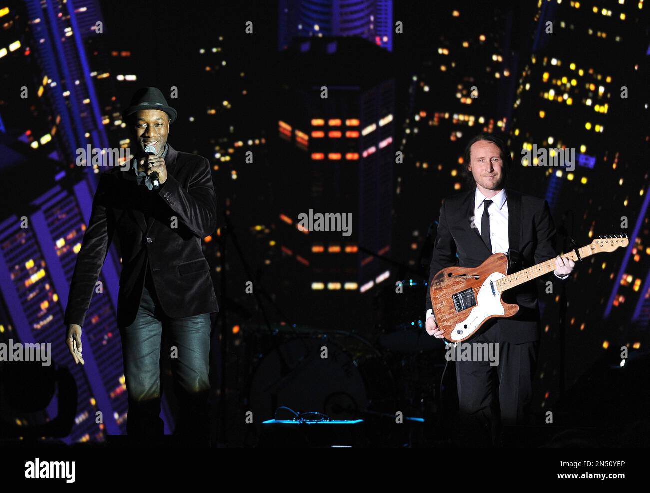 Aloe Blacc, left, and Mike Einziger perform on stage at the 31st Annual ...