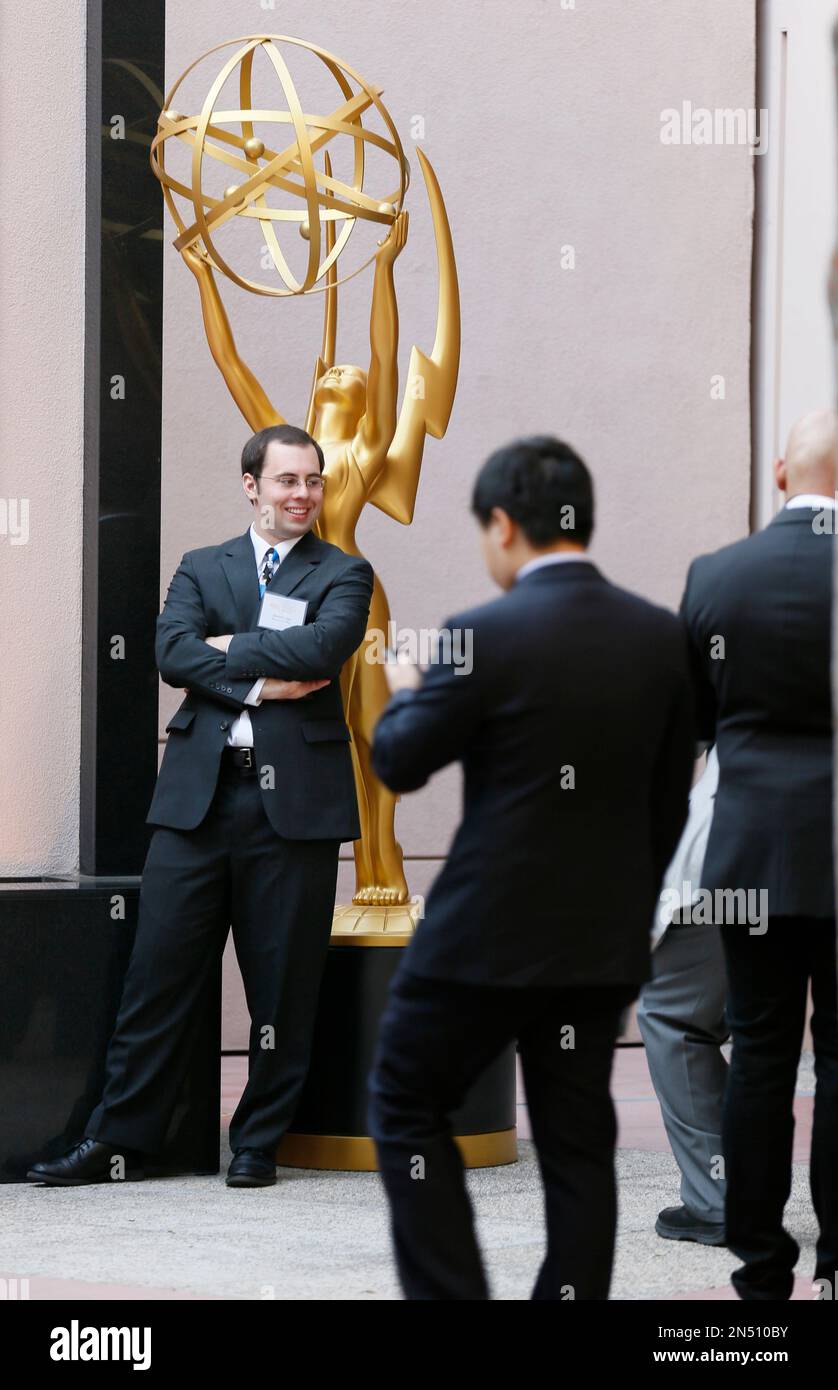 Joseph Ligo, left, poses for a photo at the 35th College Television ...