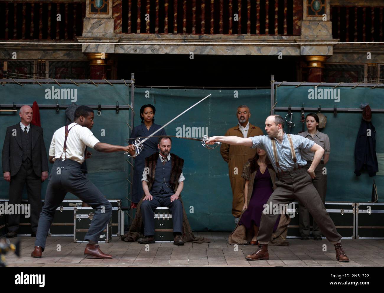 Actors perform a scene from William Shakespeare's Hamlet for members of ...