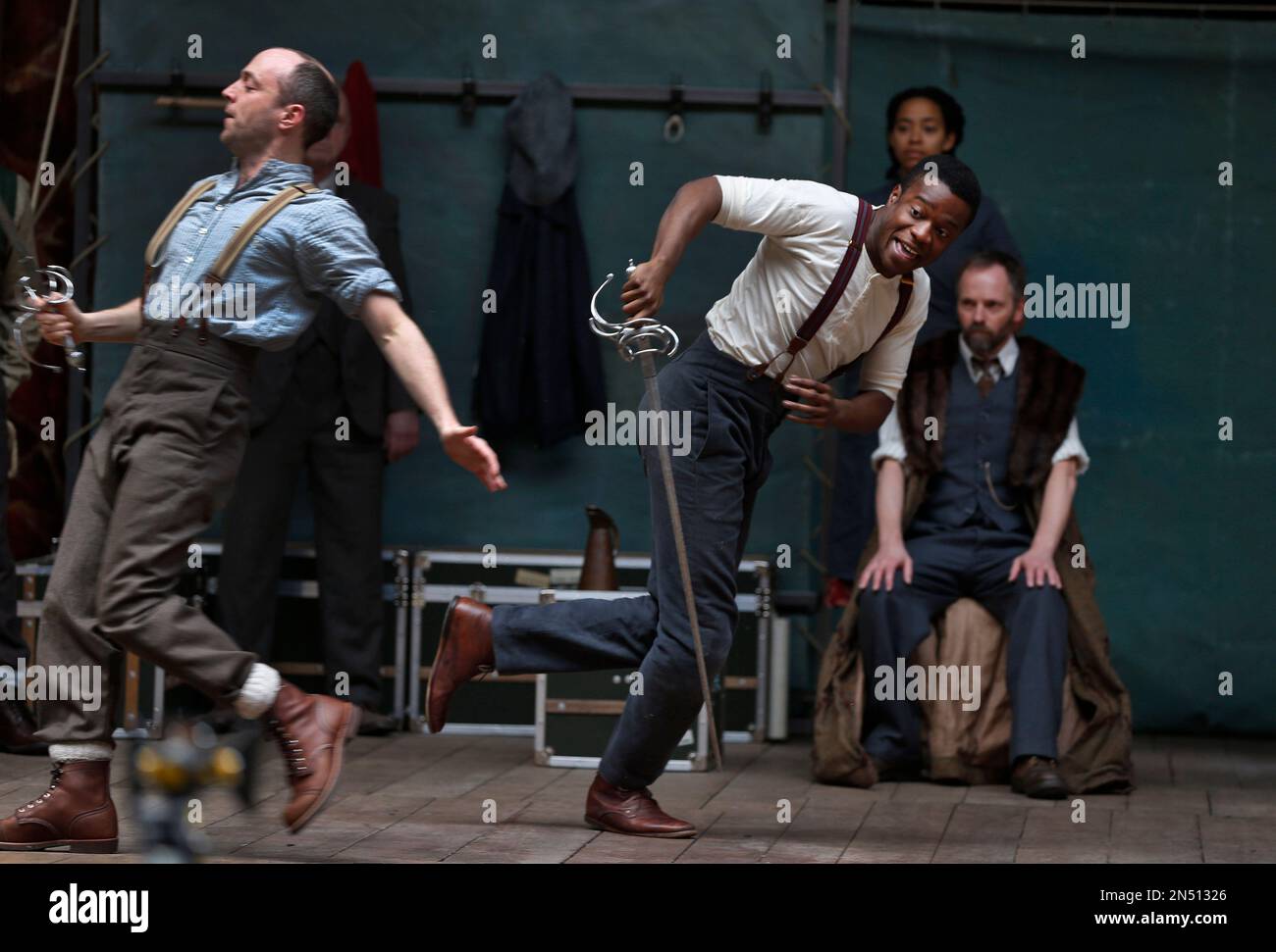 Actors perform a scene from William Shakespeare's Hamlet for members of ...
