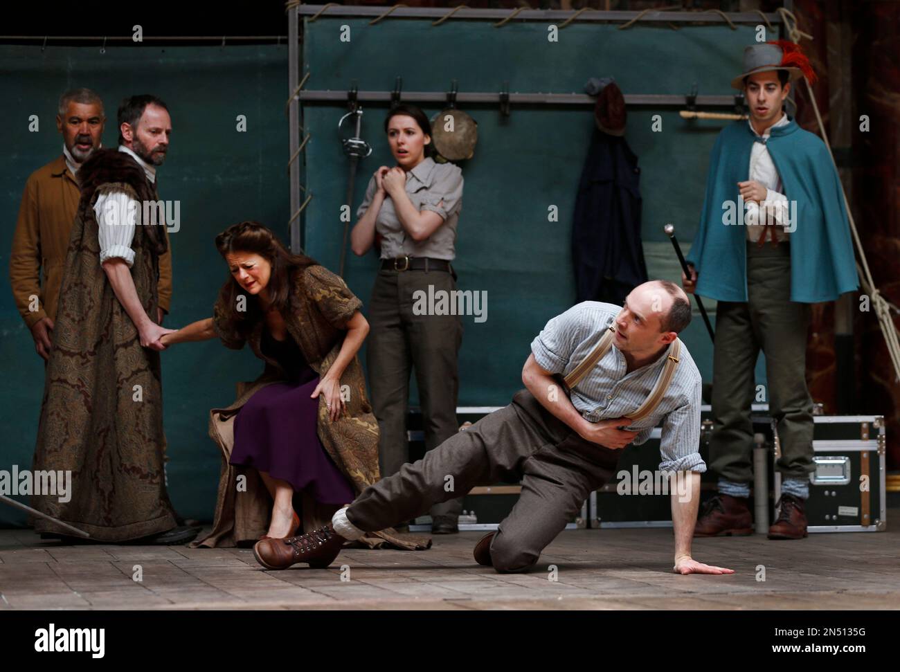 Actors perform a scene from William Shakespeare's Hamlet for members of ...