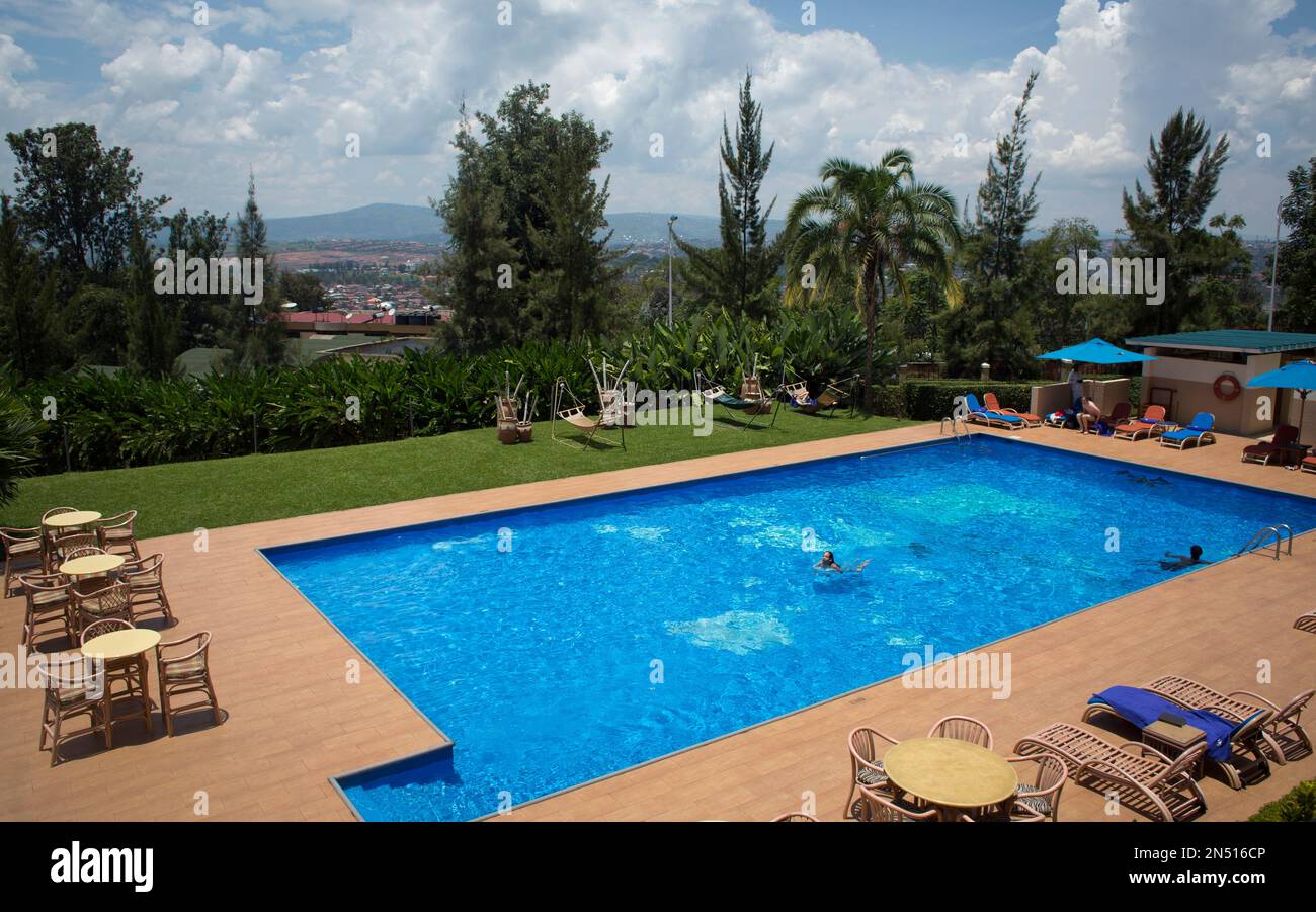 A view of the swimming pool of the Hotel des Mille Collines and skyline ...