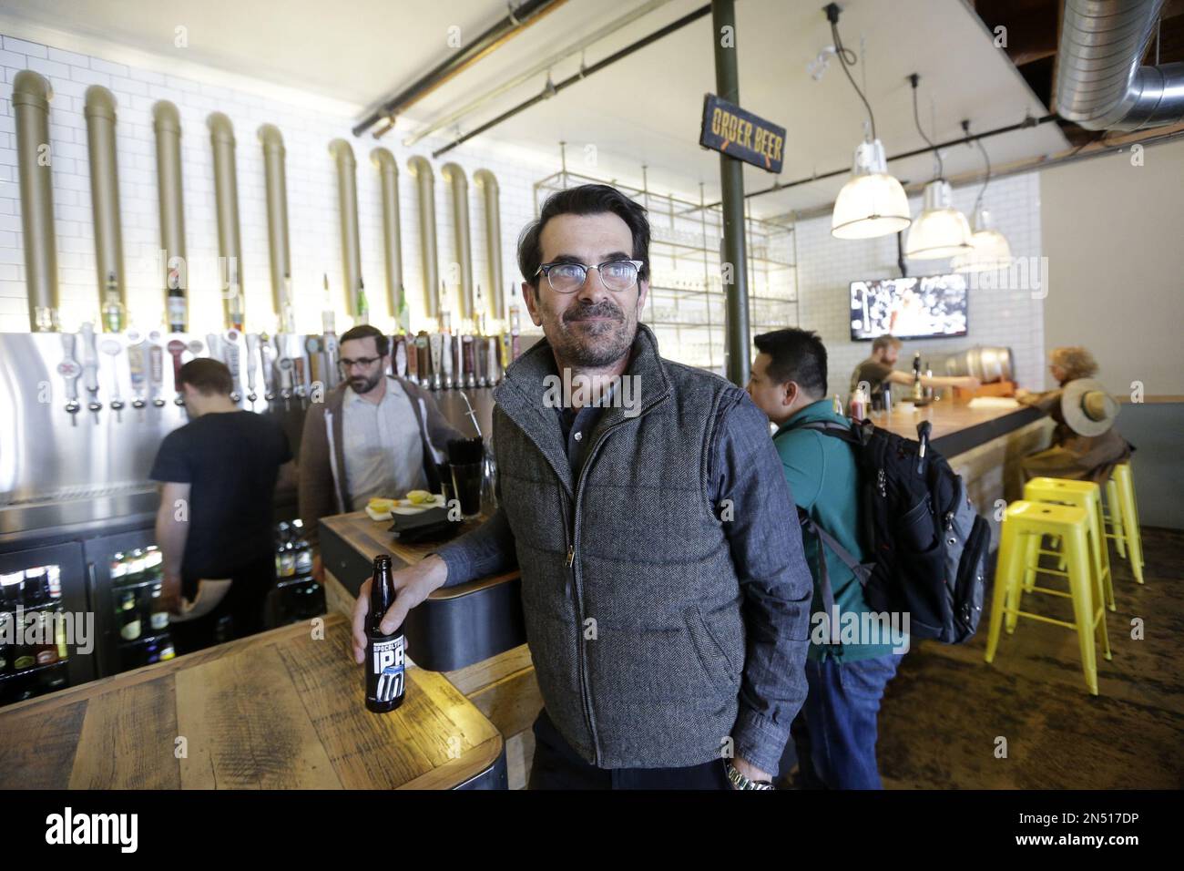 In this April 16, 2014 photo, actor Ty Burrell, who plays bumbling dad ...