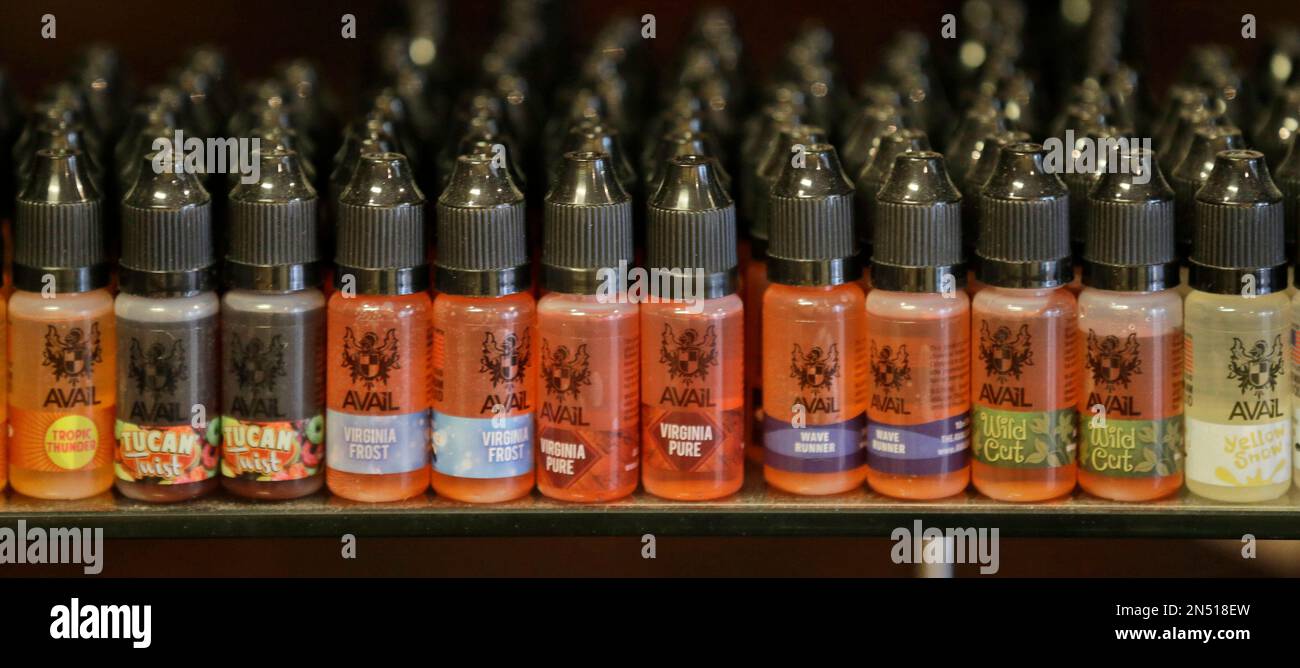 In this April 15, 2014 photo, electronic cigarette oils are on display ...