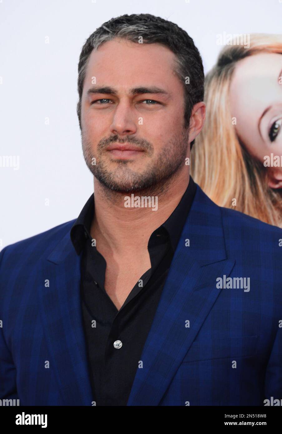 Taylor Kinney arrives at the Los Angeles premiere of "The Other Woman ...