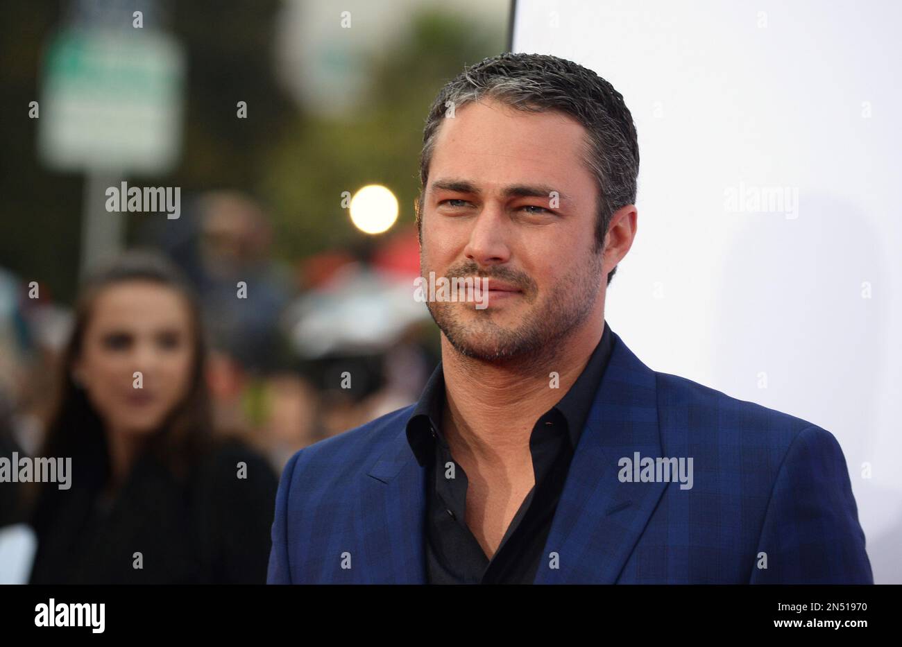 Taylor Kinney arrives at the Los Angeles premiere of "The Other Woman ...