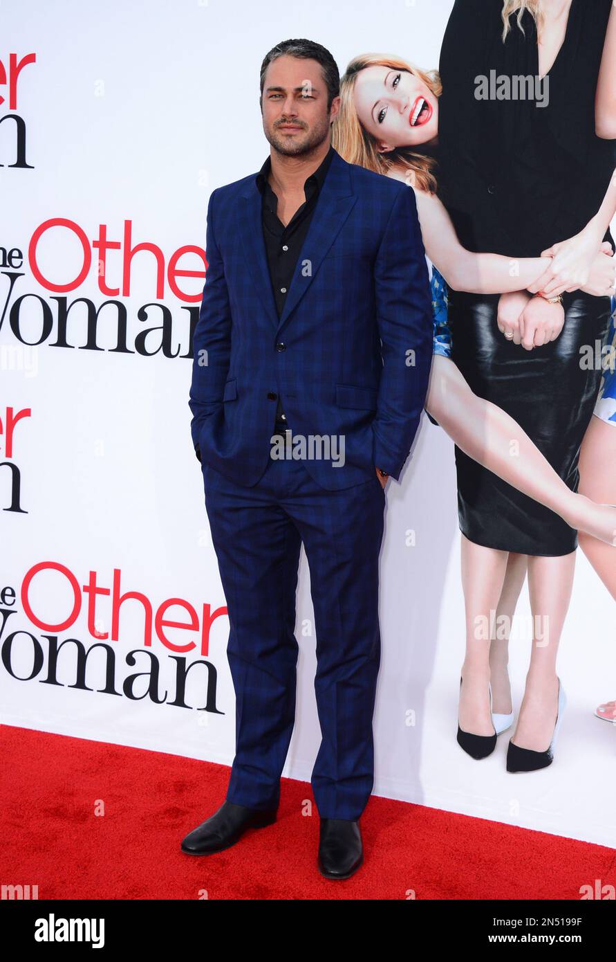 Taylor Kinney arrives at the Los Angeles premiere of "The Other Woman ...