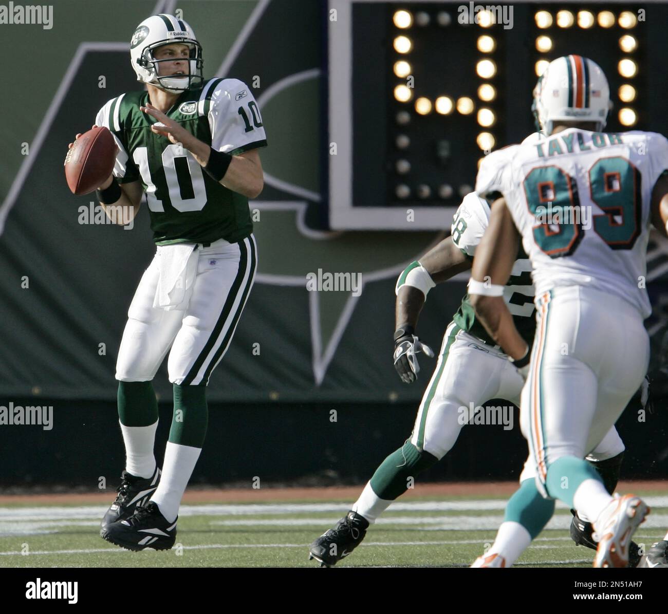 RAW FILE - New York Jets quarterback Chad Pennington drops back for a ...