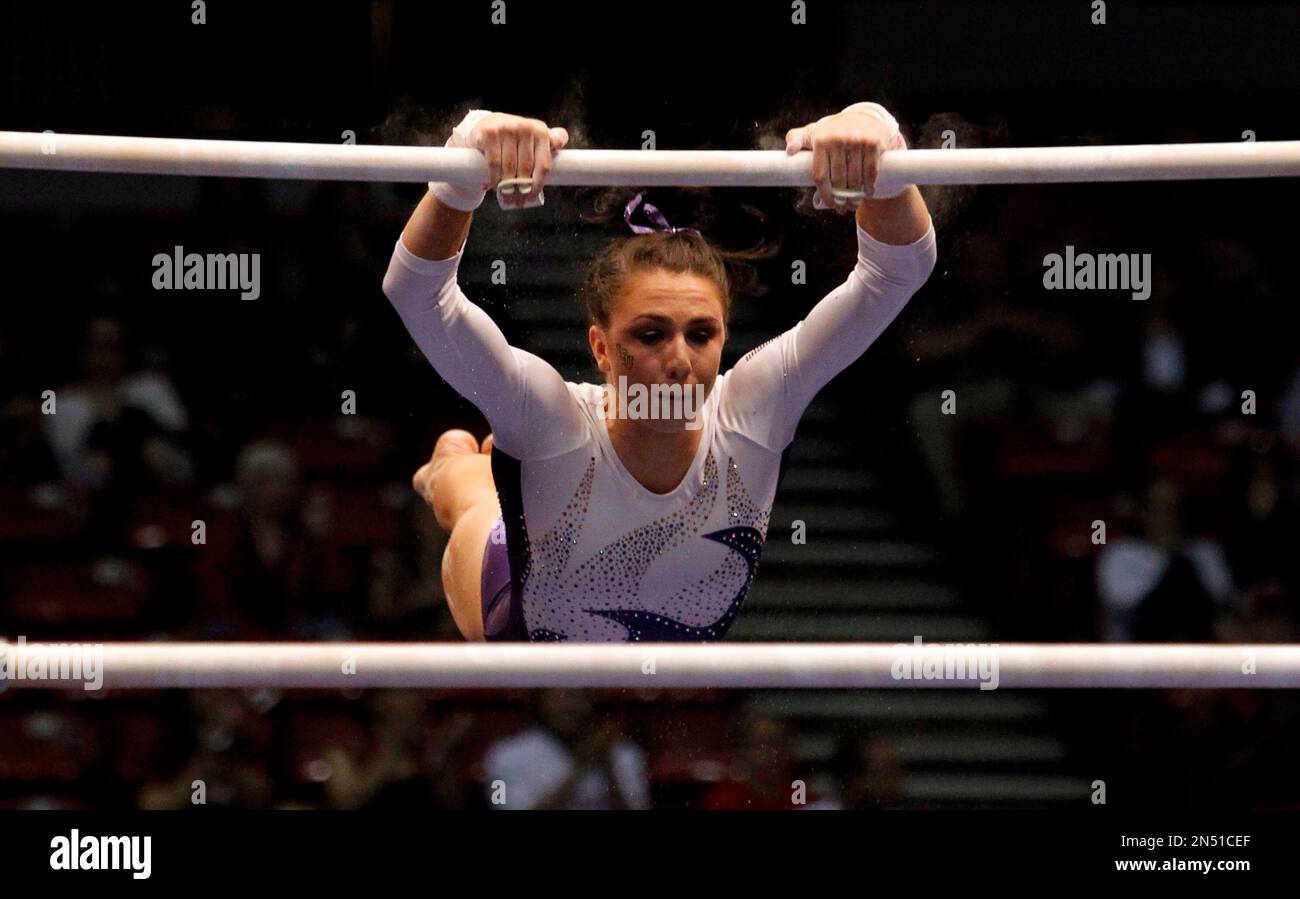 LSU's Rheagan Courville competes on the uneven bars during the ...
