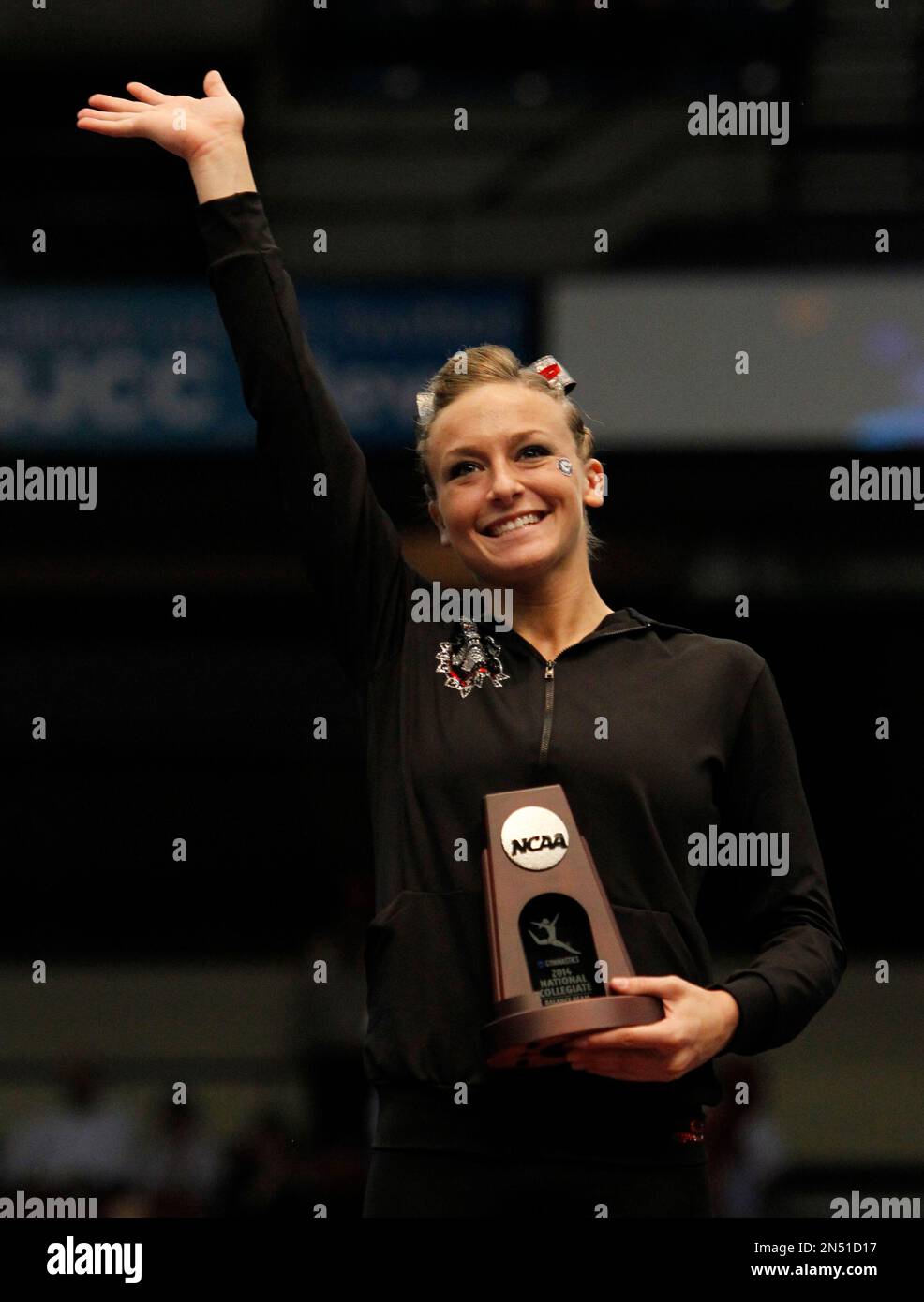 Georgia's Lindsey Cheek holds her second place trophy for balance beam ...