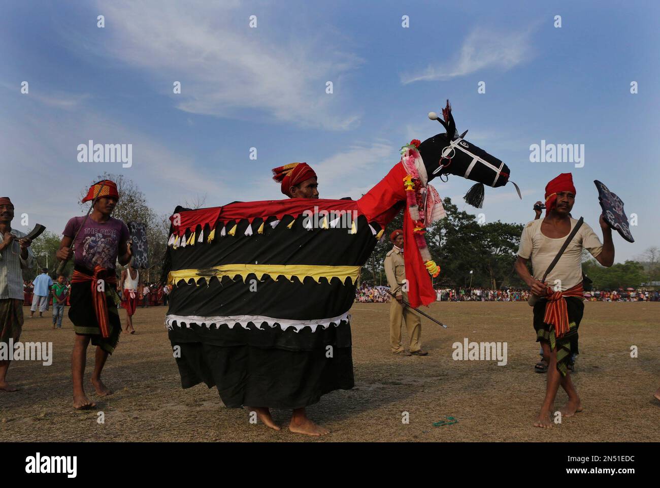 A man dressed like a horse performs the traditional Hana Ghora dance ...