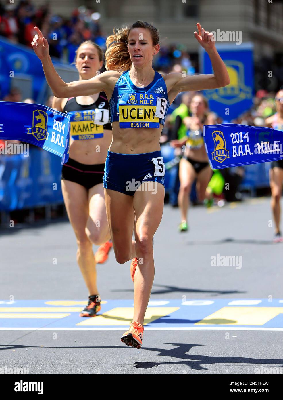 Morgan Uceny breaks the tape to win the women's division of the B.A.A ...