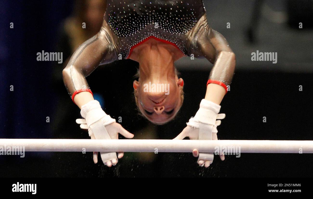 Georgia's Lindsey Cheek competes on the bars during the NCAA women's ...