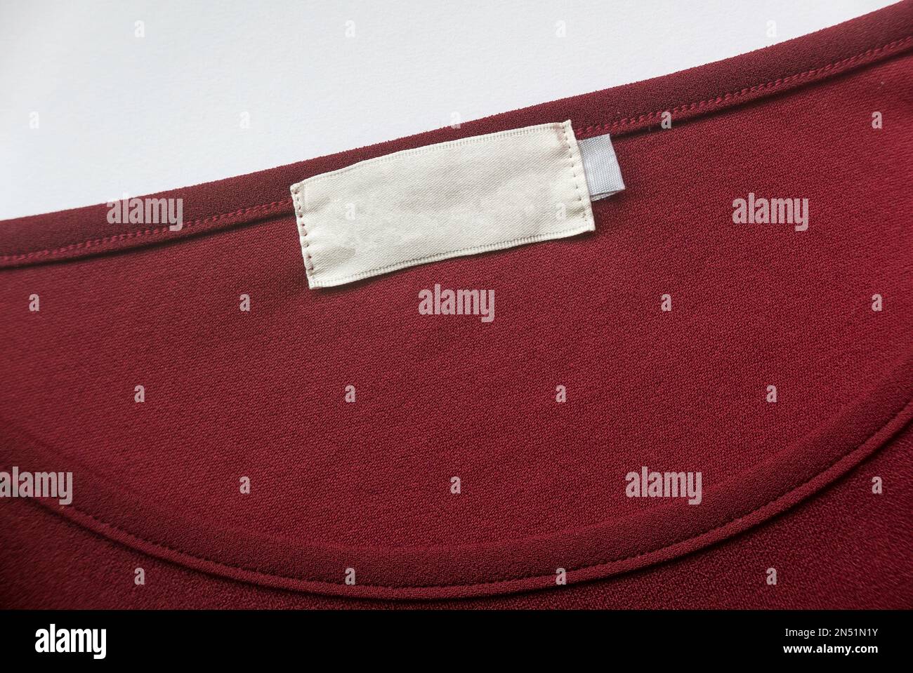 Red stitching on white cloth hi-res stock photography and images - Alamy