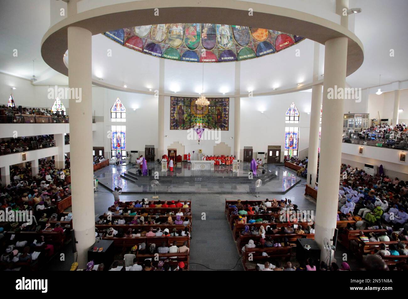 Catholics attend a Mass to celebrate Good Friday in Abuja, Nigeria ...