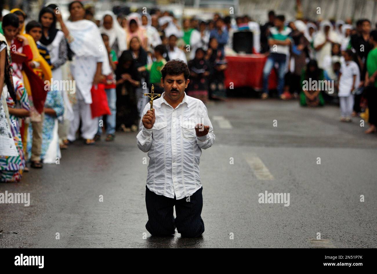 An Indian Christian devotee prays on Good Friday in Jammu, India ...