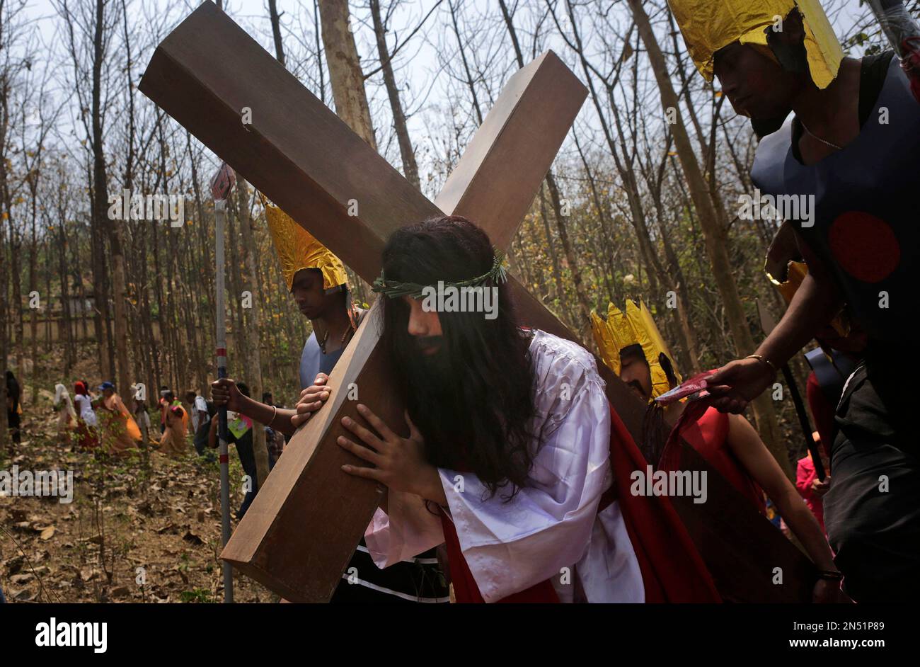 Indian Christian devotees enact the crucifixion of Jesus Christ to mark ...