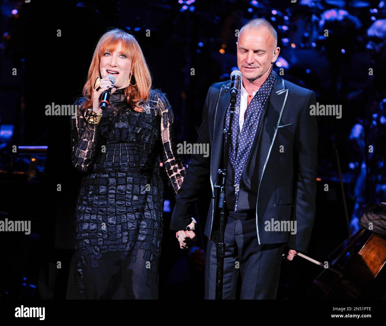Singers Patti Scialfa and Sting perform together at the 25th ...