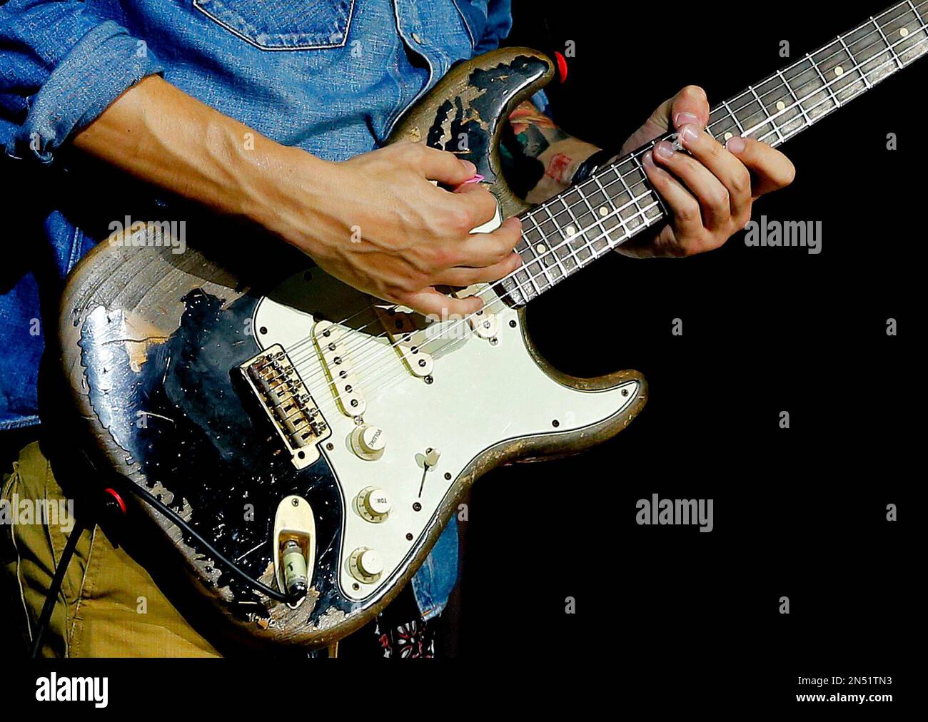 John Mayer performs with his Fender Stratocaster electric guitar in ...