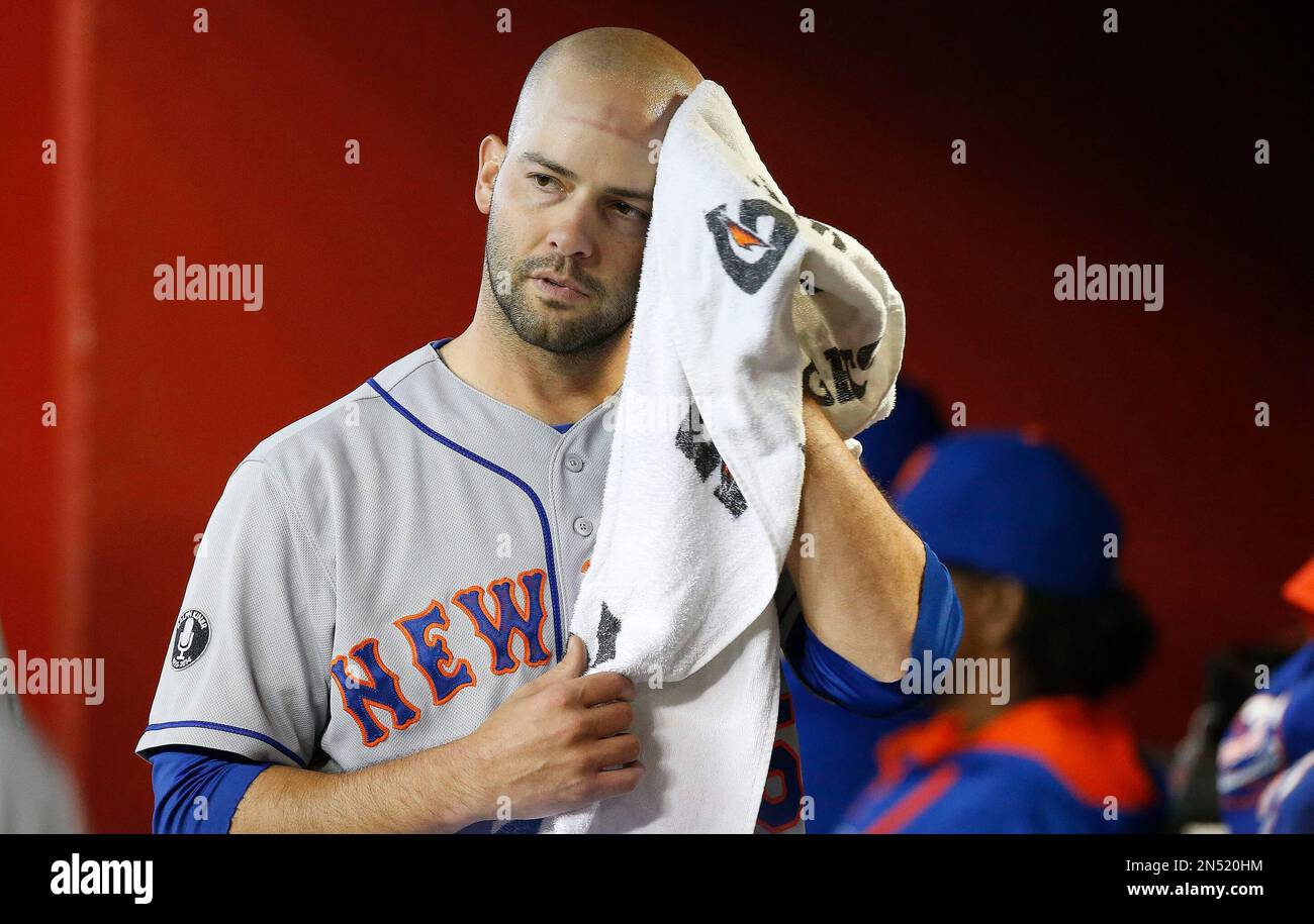 New York Mets' Dillon Gee wipes his head after he pitched against the ...