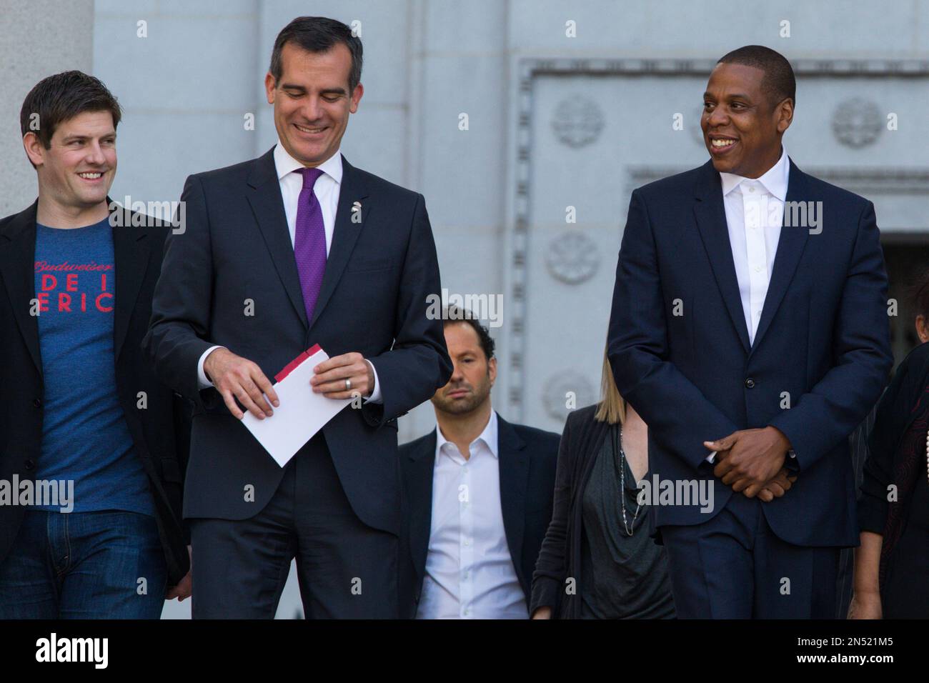 From left, Brian Perkins, Vice President of Budweiser,, Mayor Eric ...