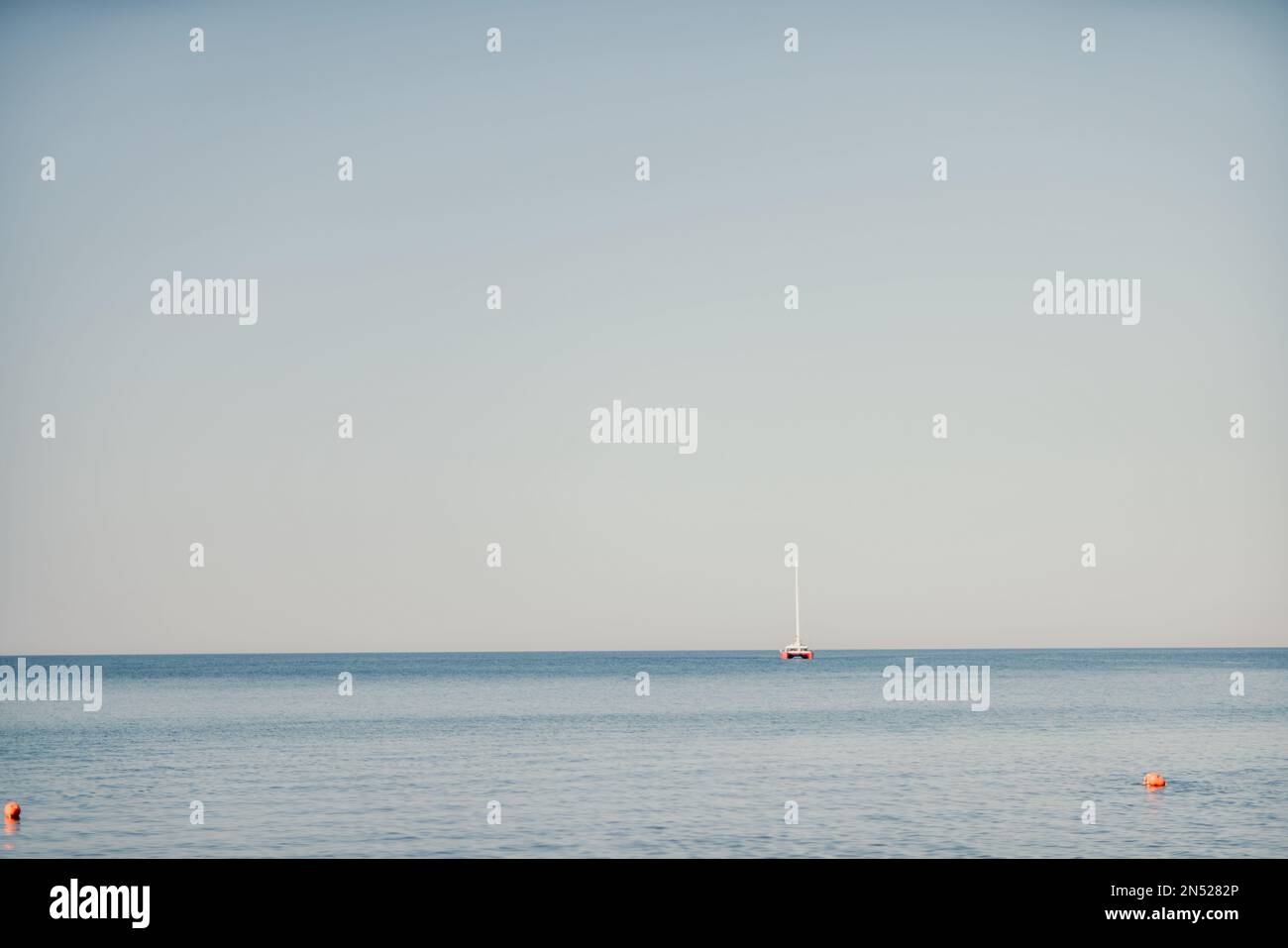 Aerial yacht on calm sea. Luxury cruise trip. View from above of white ...