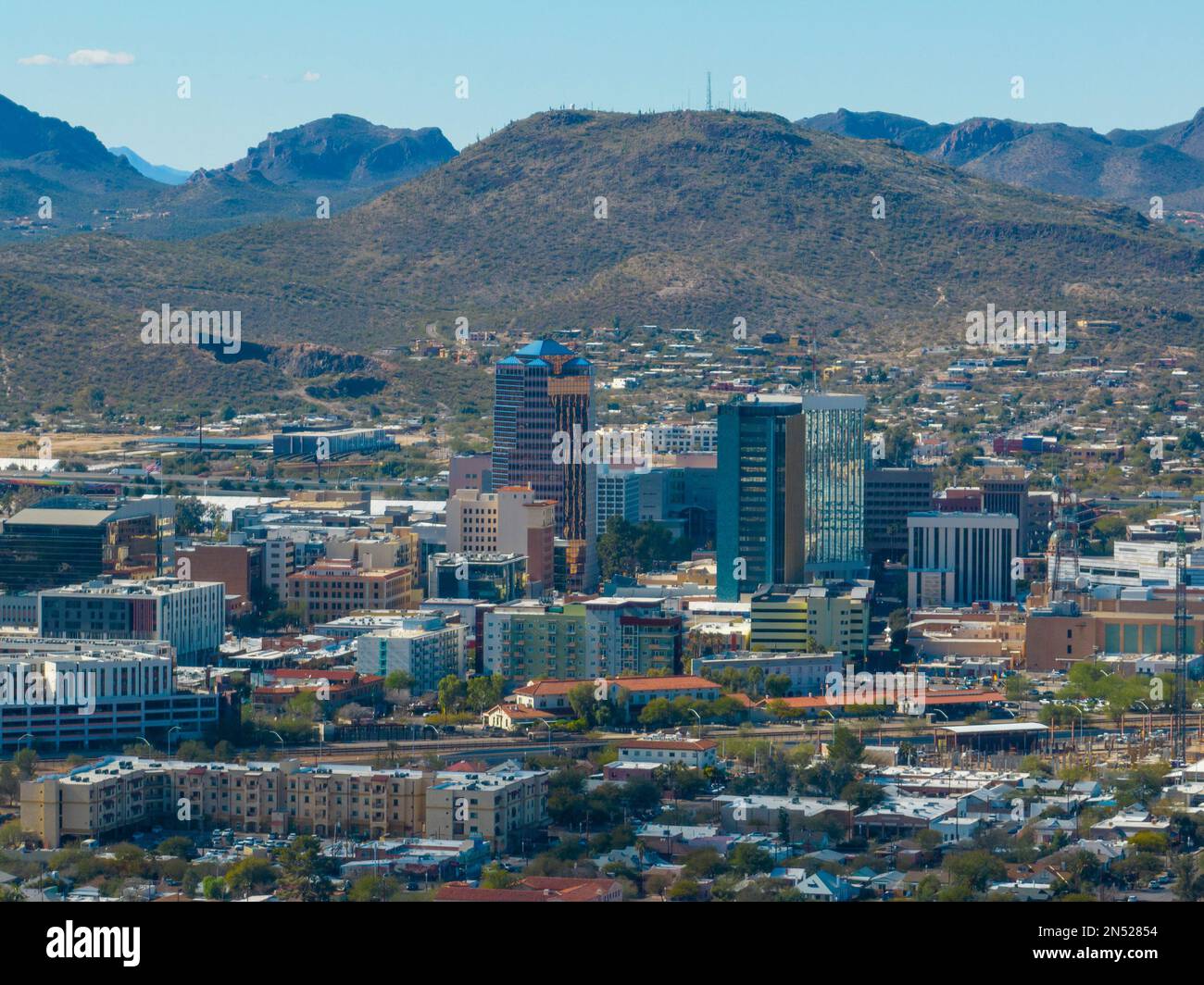 Tucson downtown modern skyscrapers aerial view with Tucson Mountain at ...