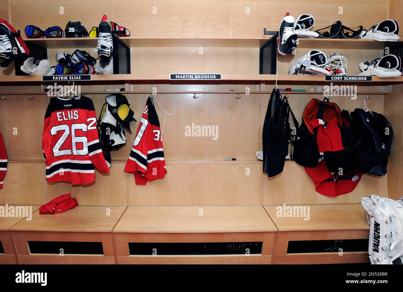The locker of New Jersey Devils goaltender Martin Brodeur is empty as ...