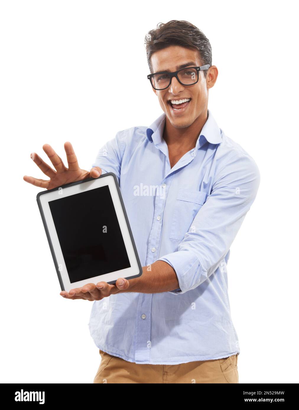 Introducing the newest tablet. Portrait of a handsome young man happily ...