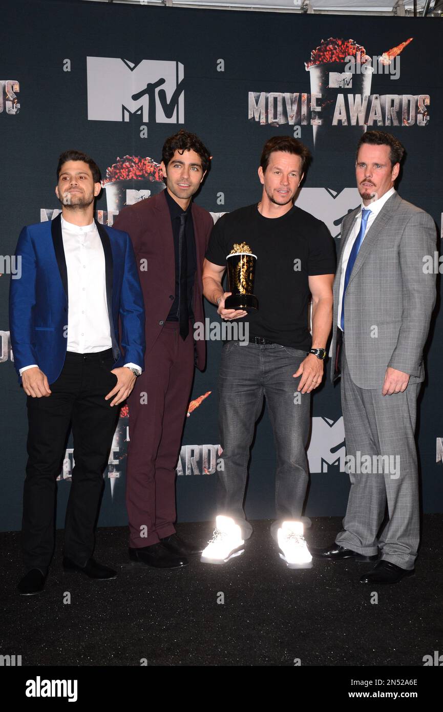 From left, Jerry Ferrara, Adrian Grenier, Mark Wahlberg, winner of MTV ...