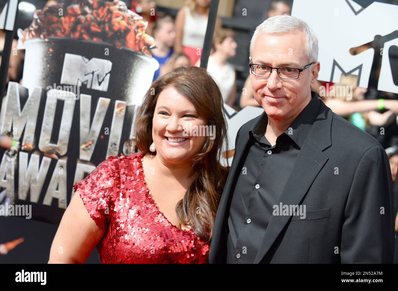 Dr. Annette Ermshar, left, and Dr. Drew Pinsky arrive at the MTV Movie ...