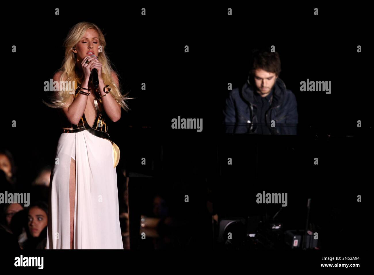 Ellie Goulding, left, and Zedd perform on stage at the MTV Movie Awards ...