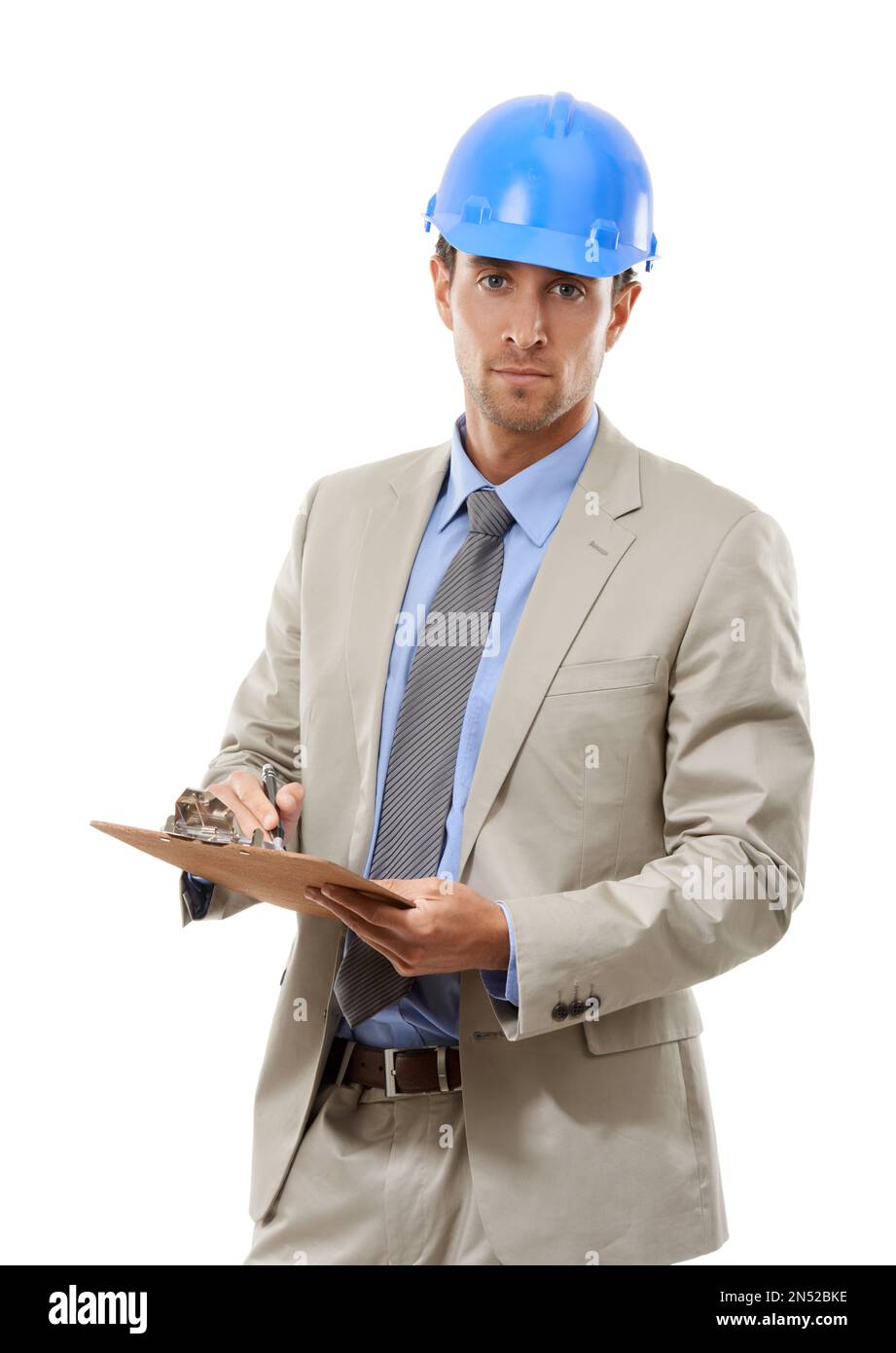 This is a thorough inspection. Studio portrait of a handsome young ...