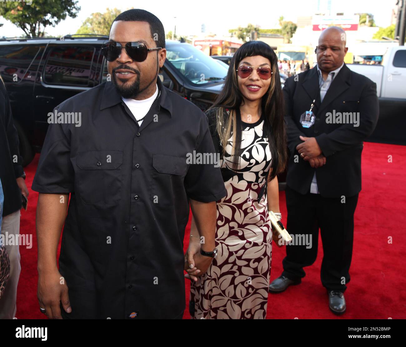 Ice Cube, left, and Kimberly Woodruff arrive at the MTV Movie Awards on ...