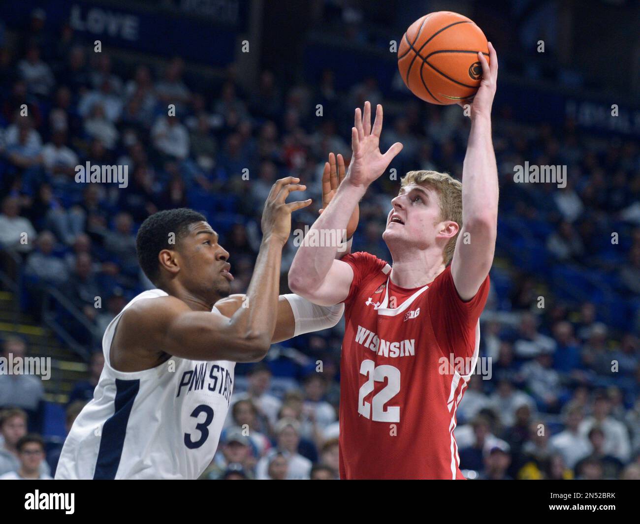 Wisconsin's Steven Crowl (22) shoots against Penn State's Kebba Njie (3 ...