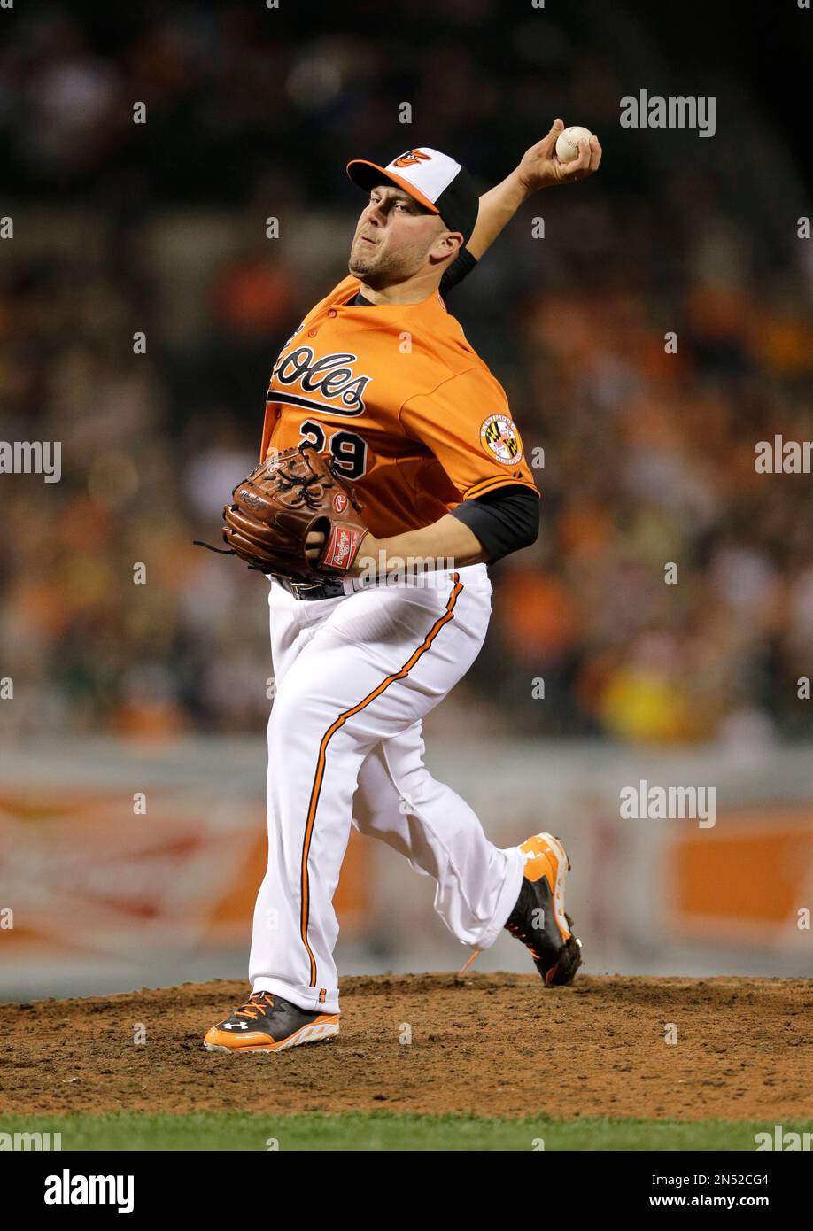 Baltimore Orioles relief pitcher Tommy Hunter throws to the Toronto ...