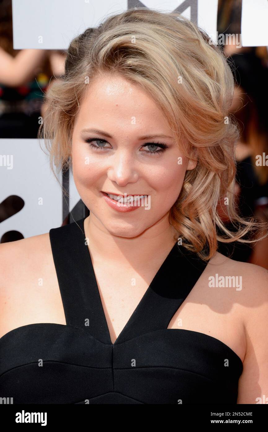 Poppy Jamie arrives at the MTV Movie Awards on Sunday, April 13, 2014 ...