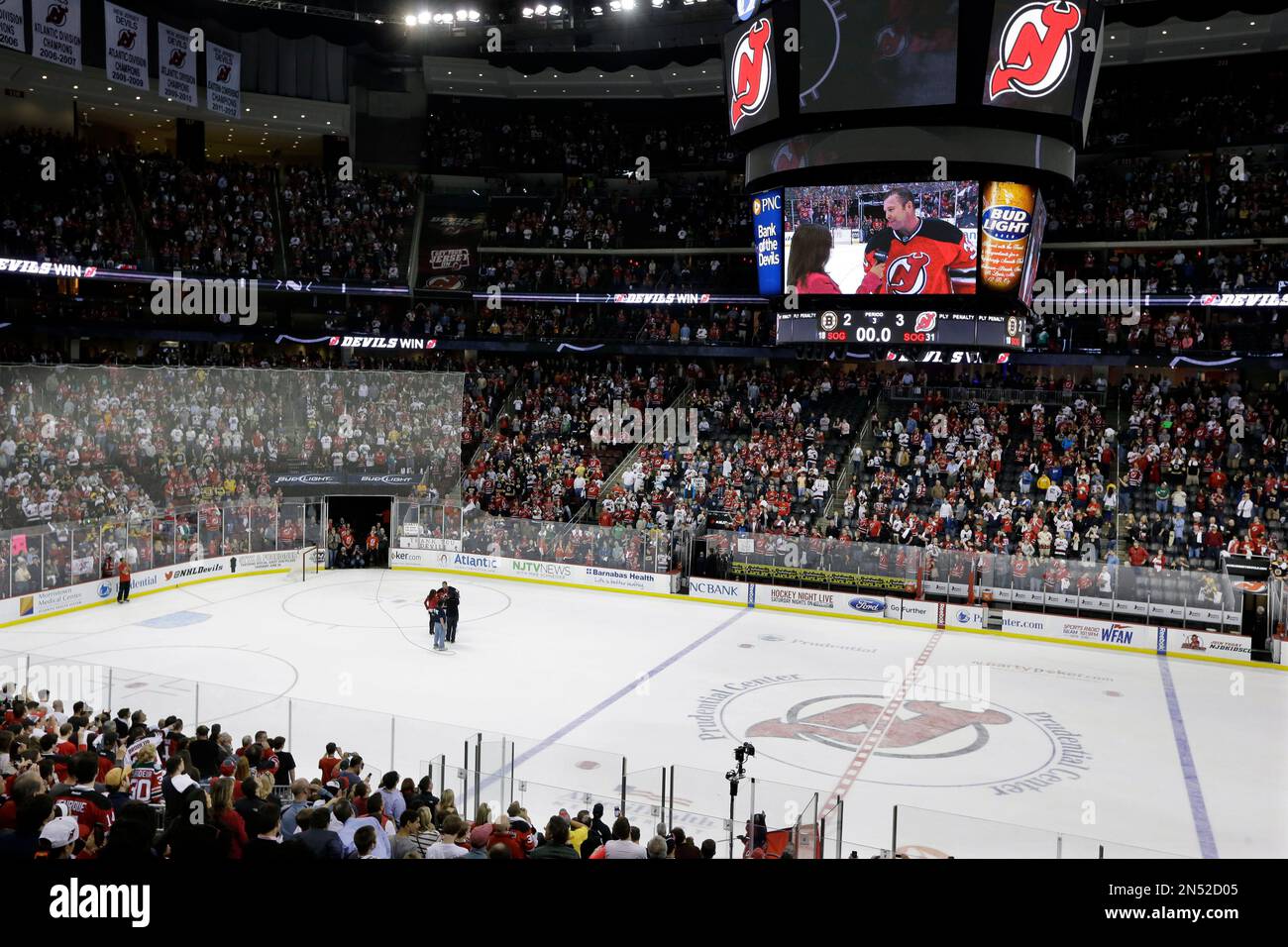 The crowd cheers as New Jersey Devils goalie Martin Brodeur is ...