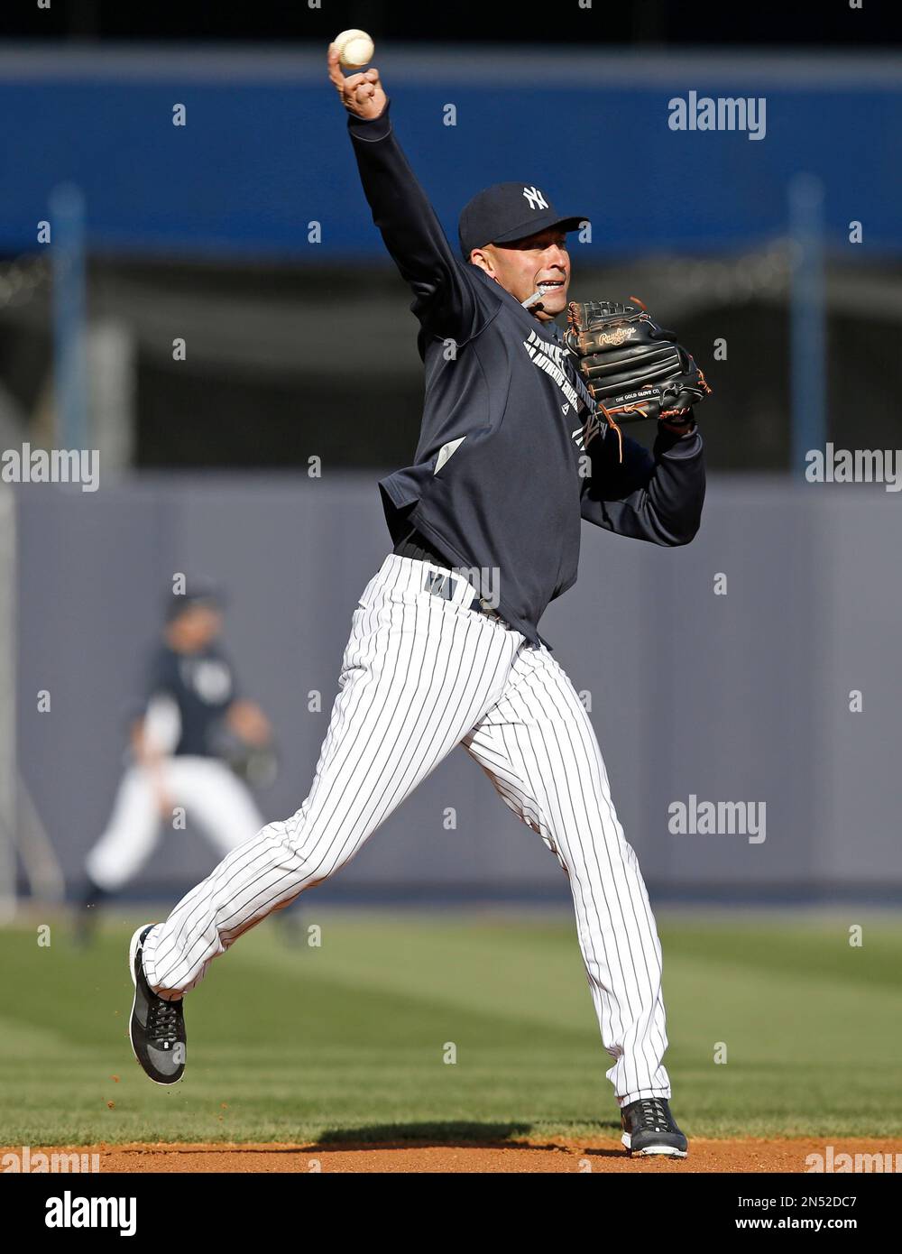 New York Yankees shortstop Derek Jeter throws a baseball while working ...