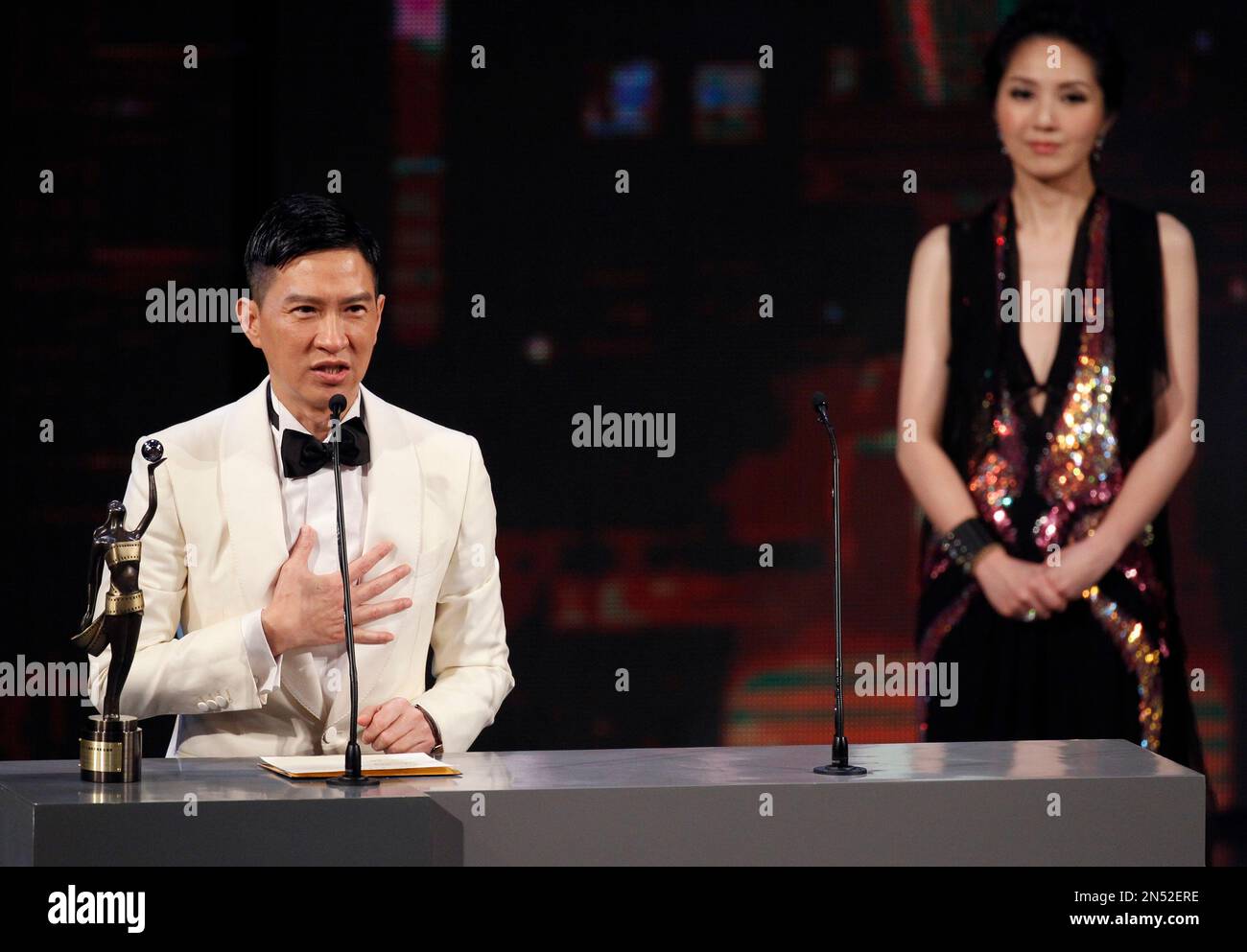 Hong Kong actor Cheung Ka Fai reacts after winning the Best Actor award ...