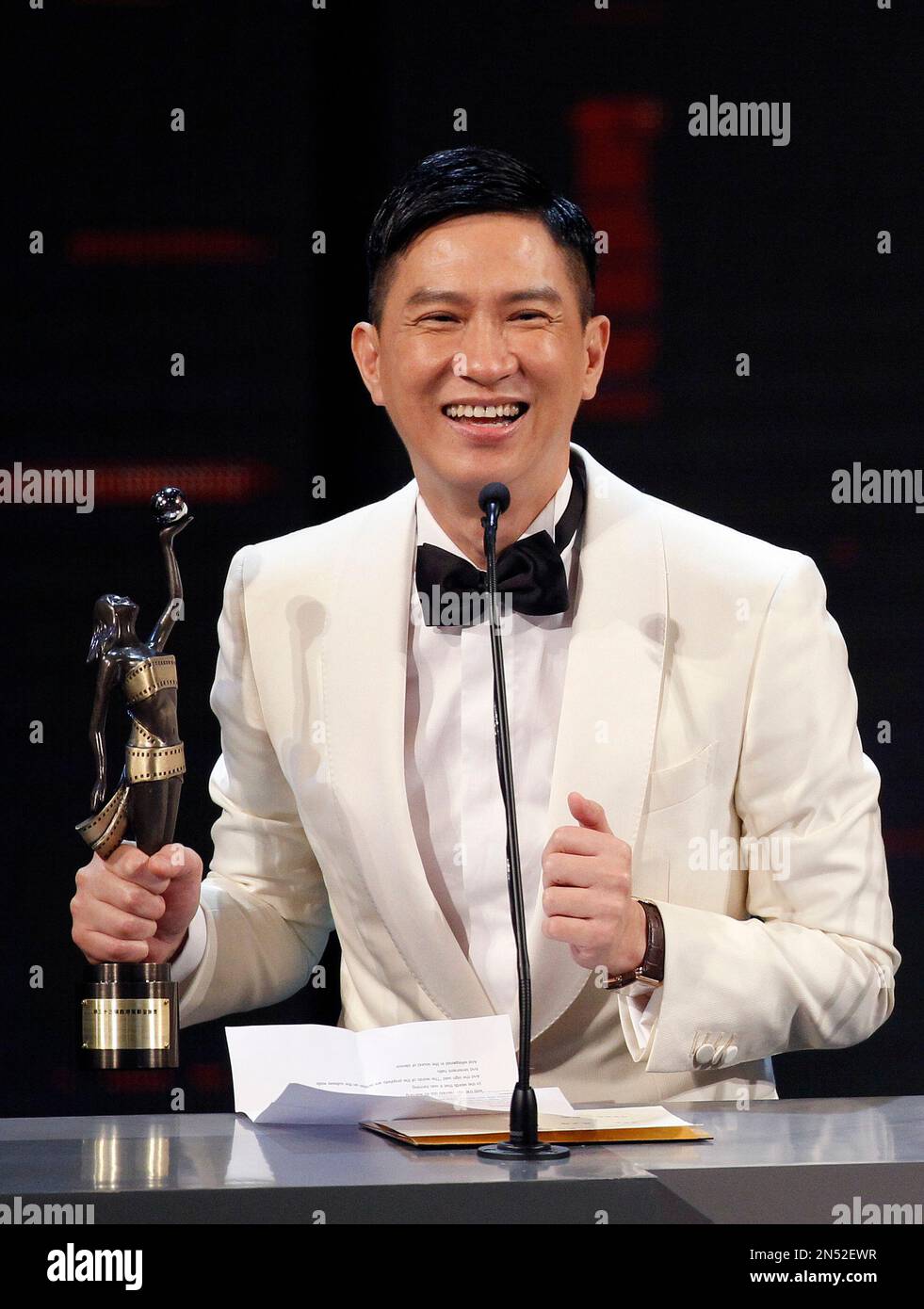 Hong Kong actor Cheung Ka Fai reacts after winning the Best Actor award ...