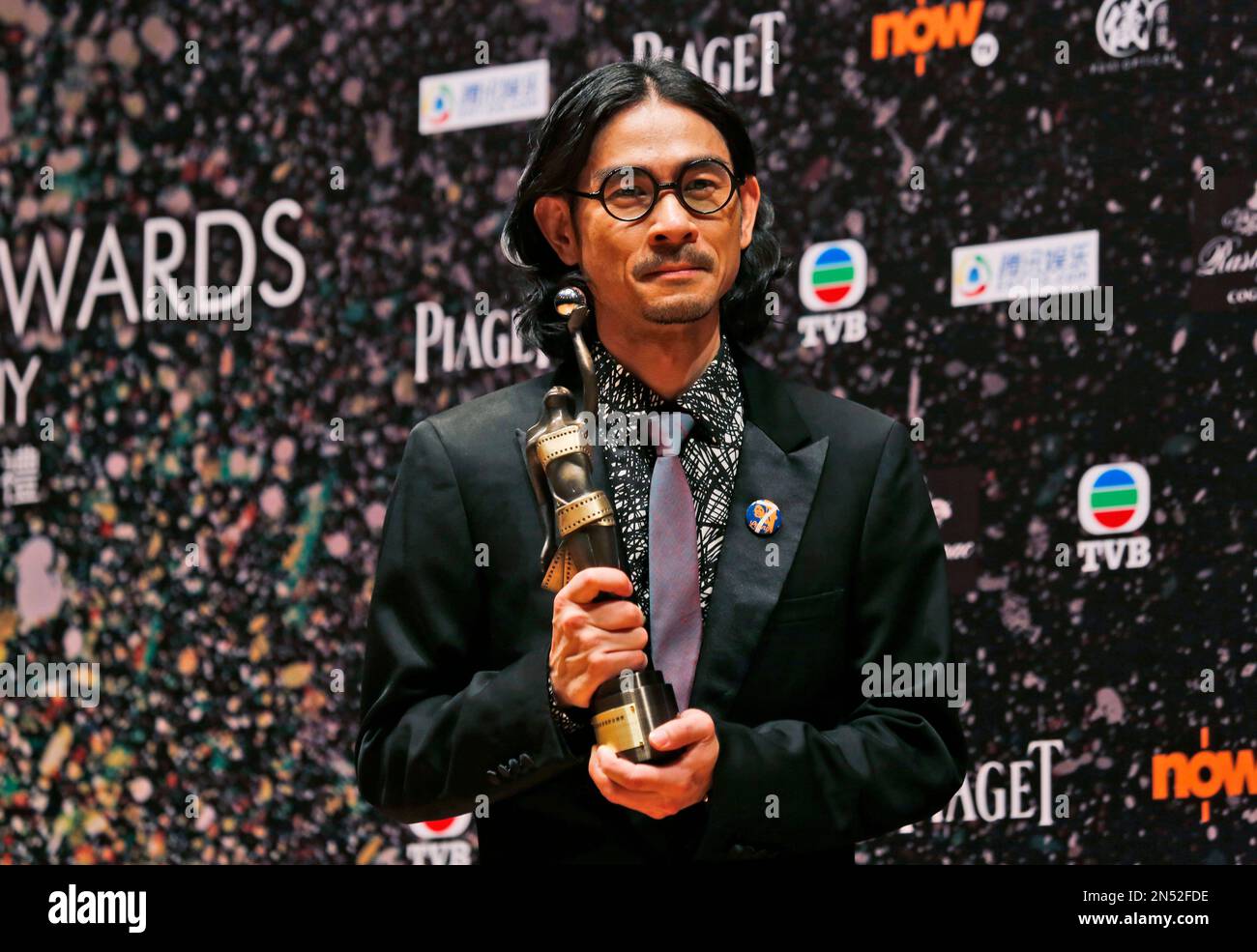 Hong Kong director Adam Wong poses after winning the Best New Director ...