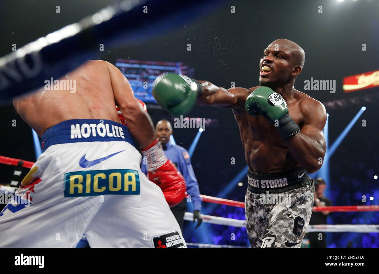 Timothy Bradley, right, throws a right against Manny Pacquiao, of the ...