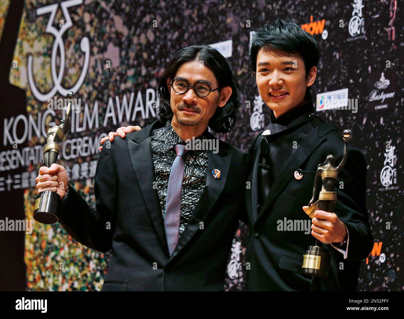 Hong Kong director Adam Wong, left, and actor Babyjohn Choi pose after ...