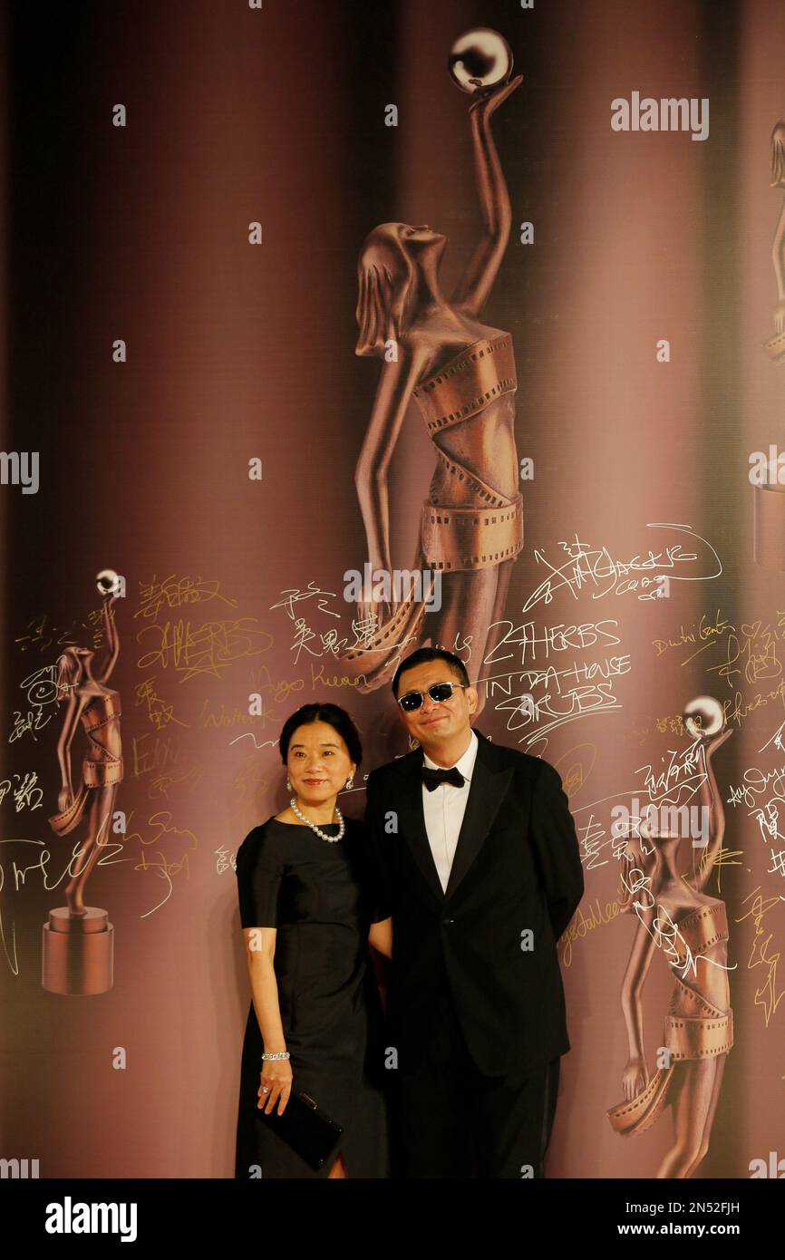Hong Kong director Wong Kar-wai and his wife Esther pose on the red ...