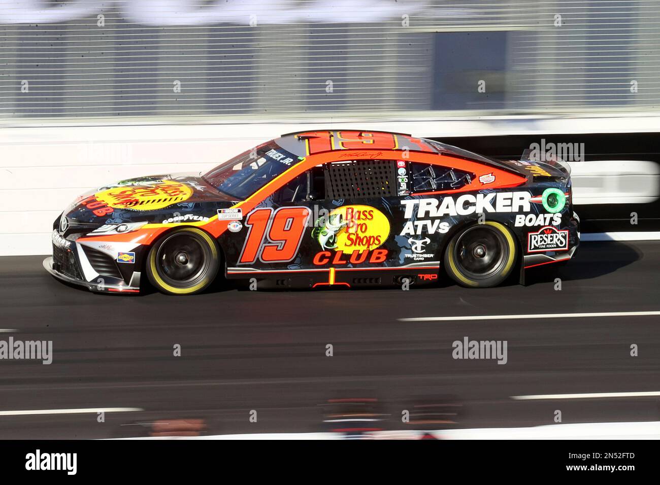 NASCAR Cup Series driver Martin Truex Jr. (19) races the finish line ...