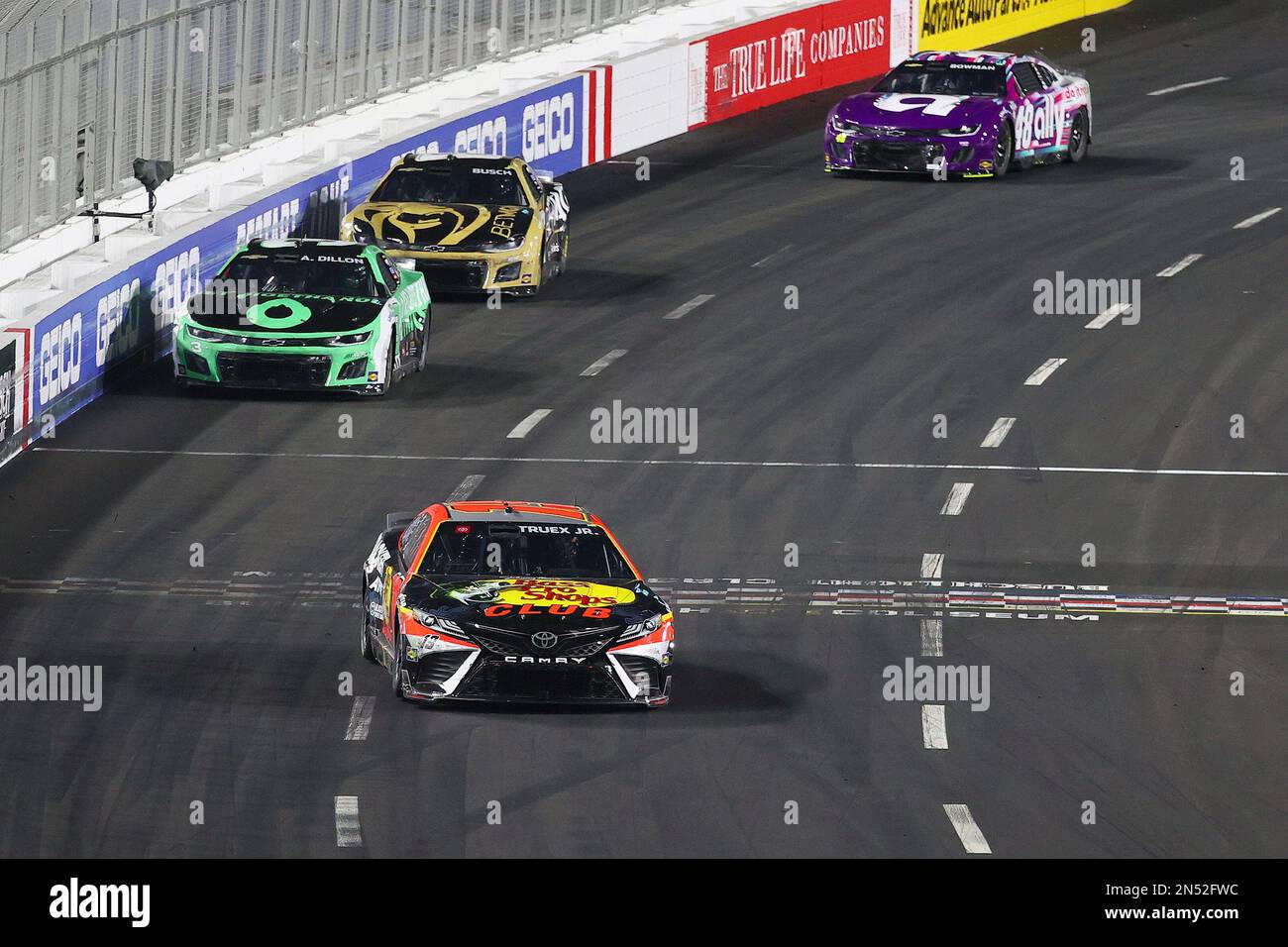 NASCAR Cup Series driver Martin Truex Jr. (19) crosses the finish line ...