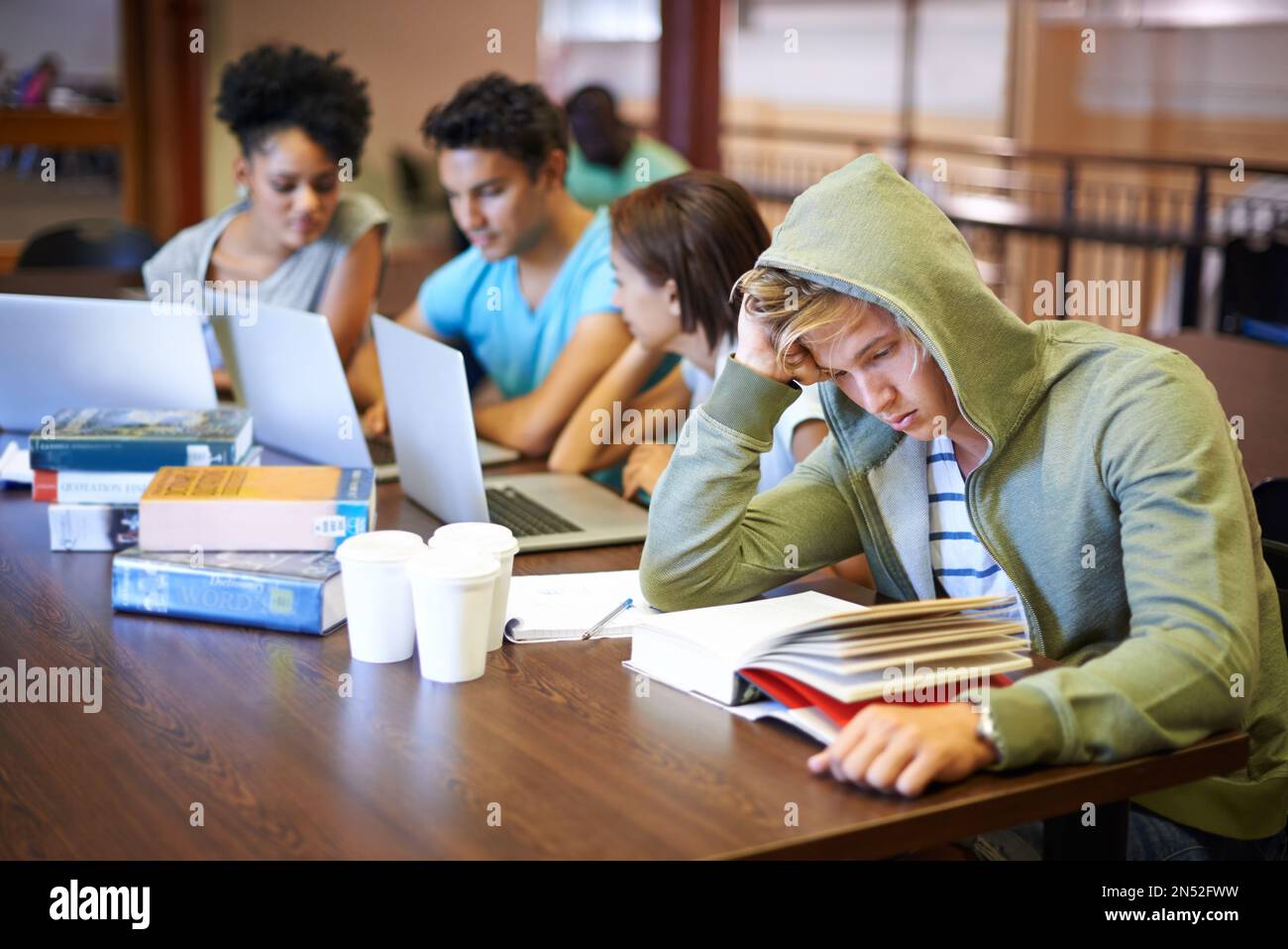 Working together to prepare for finals. A group of young people ...